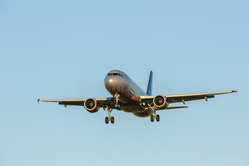 Large airplane in the sky stock image. Image of landing - 111964041