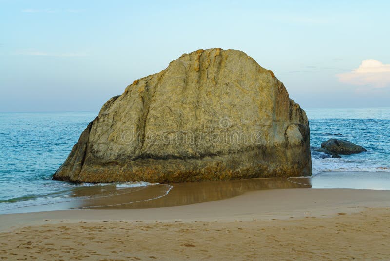 A Large Alone Rock on a Sandy Beach Stock Photo - Image of landscape ...