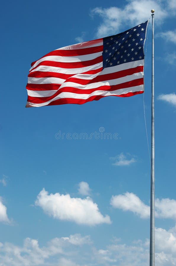Large American Flag Waving in the Wind Stock Photo - Image of armed ...