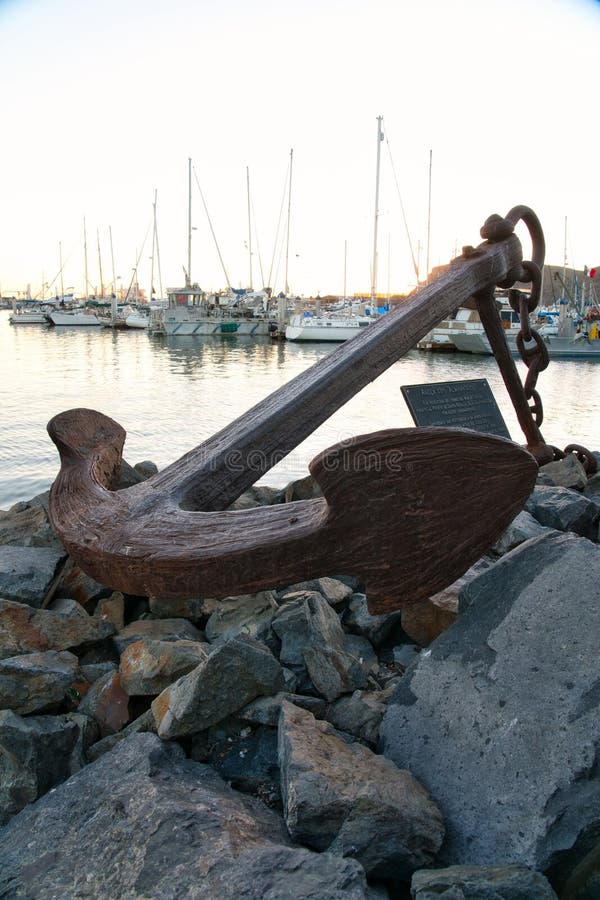 Large Anchor Statue at a Port Stock Photo - Image of sailing, water ...