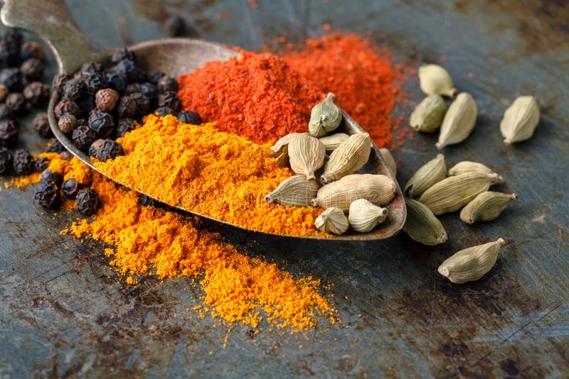 Large Assortment of Spicy Spices in Spoons on Dark Background Stock ...
