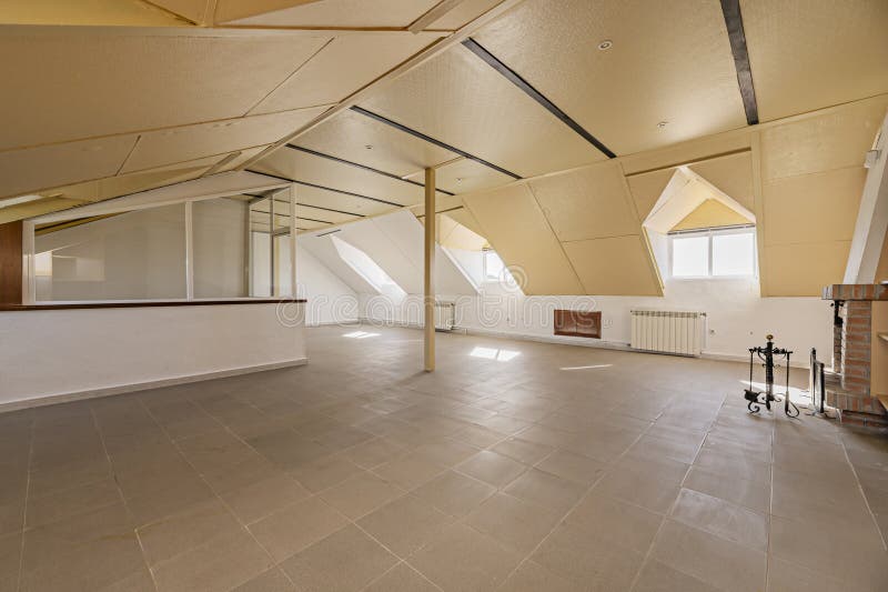 Large Attic Attic with a Metal Column in the Center Stock Image - Image ...