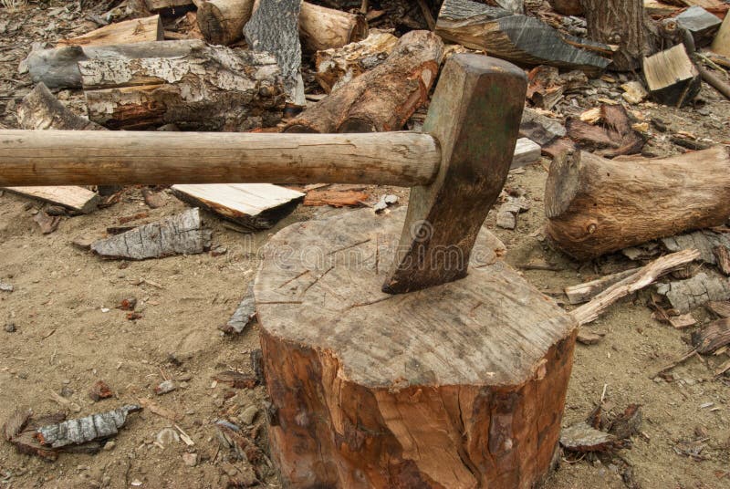 Large Ax Stuck into Tree Stump Stock Image - Image of strewn, winter ...