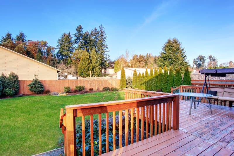 Large Back Yard with Lots of Grass and Deck. Stock Image - Image of ...