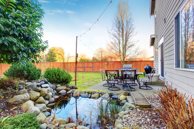 Large backyard with patio. stock image. Image of deck - 55959303