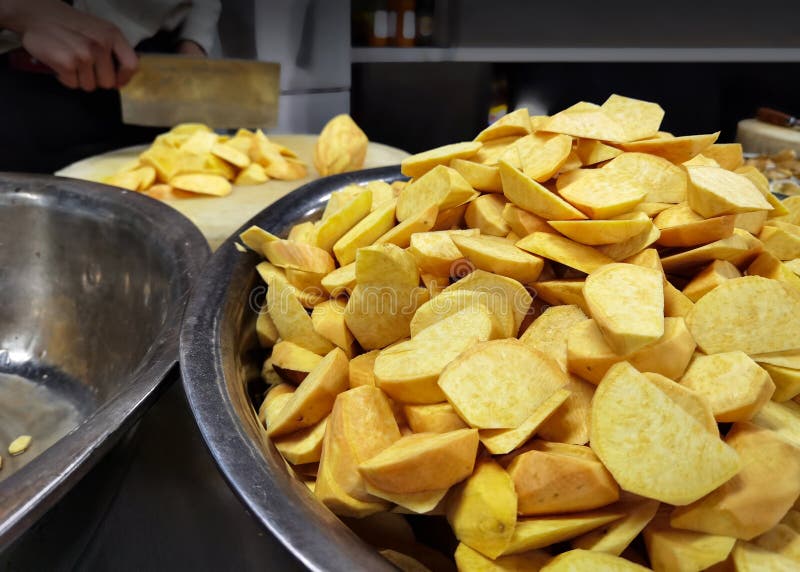 A Large Basin of Cut Triangular Sweet Potato Chunks. Stock Photo ...