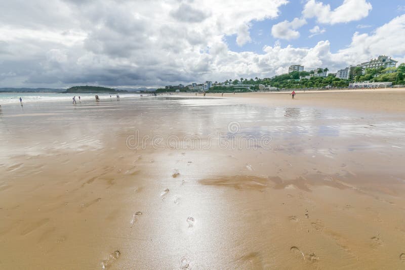 Large beach in ebb tide stock photo. Image of panoramic - 166123512