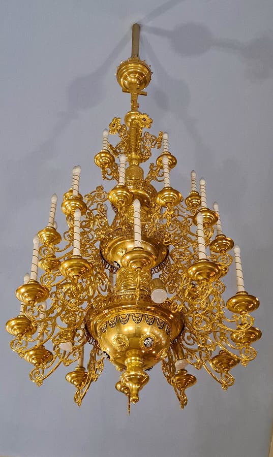 Large Beautiful Gilded Chandelier with Candles Under the Dome of High ...