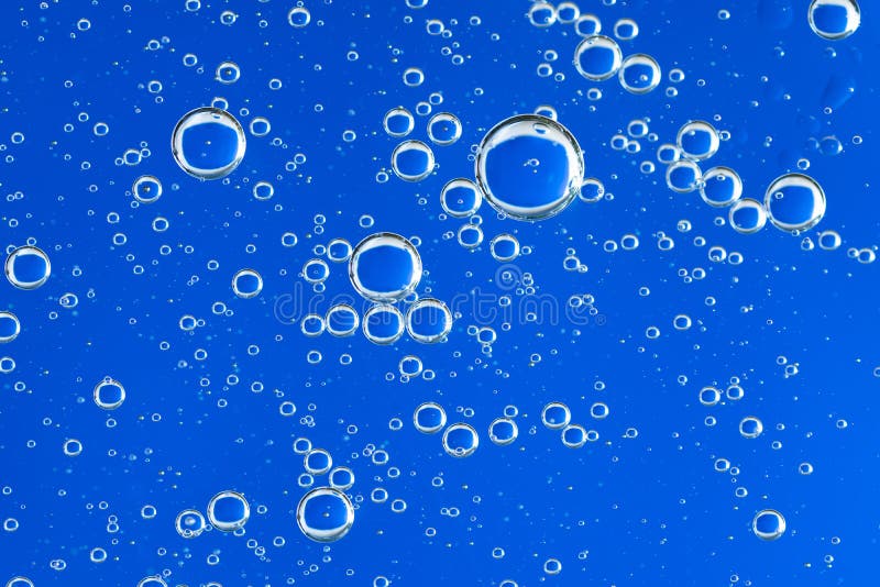 Large Beautiful Oxygen Bubbles Underwater on a Blue Background Macro ...