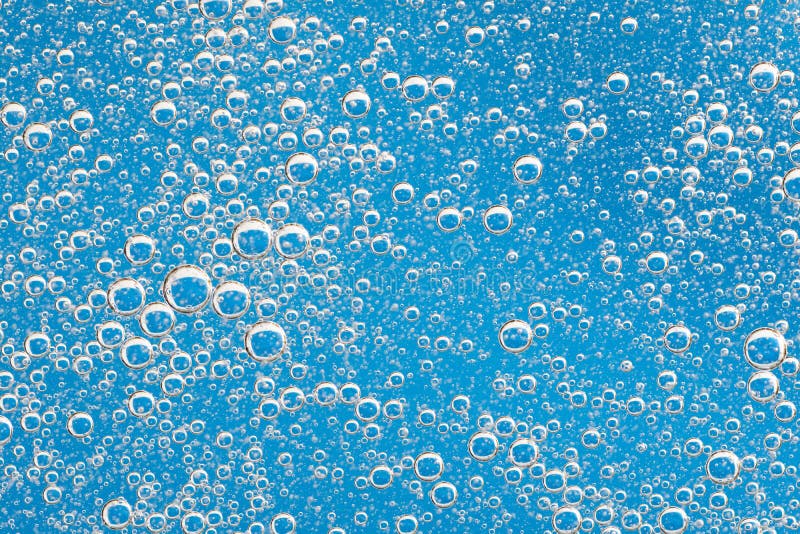 Large Beautiful Oxygen Bubbles Underwater on a Blue Background Macro ...