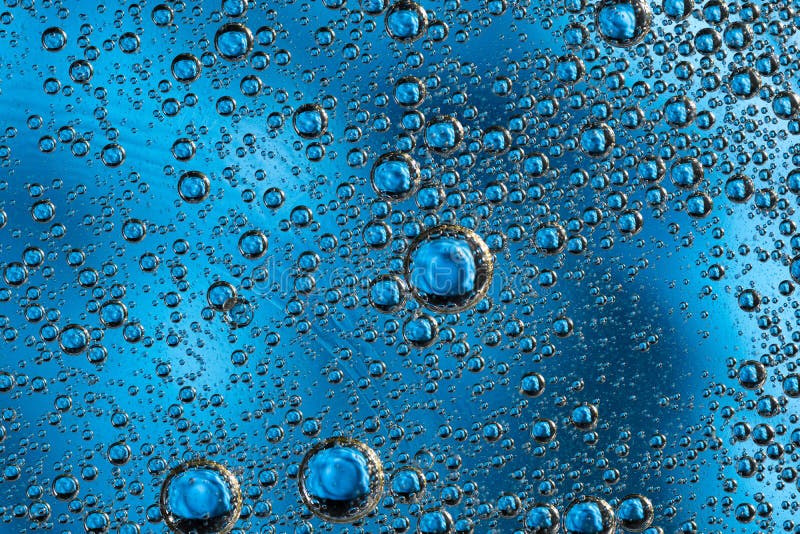 Large Beautiful Oxygen Bubbles Underwater on a Blue Background Macro ...