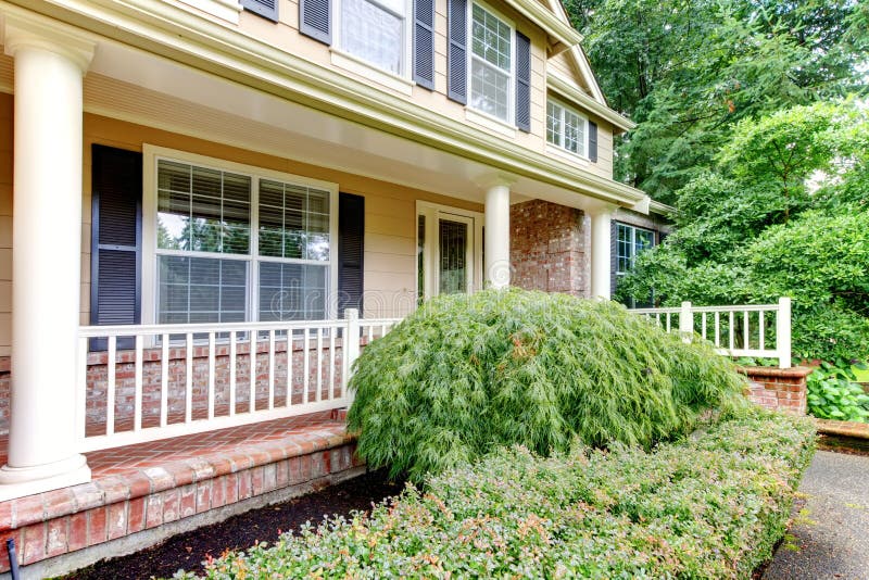 Large Beige House with Covered Front Porch Stock Photo - Image of home ...
