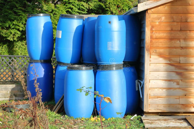 Blue Plastic Compost Bins stock photo. Image of outside - 104963678