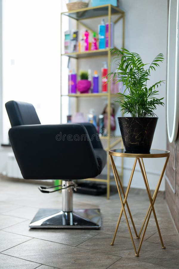 A Large Black Chair in the Interior of a Beauty Salon Stock Image ...