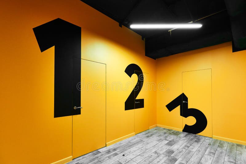 Large Numbers from One To Three on Yellow Walls in a Room with Doors ...