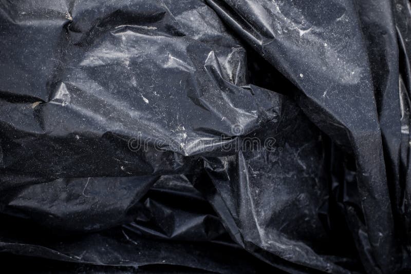 Large Black and Rumpled Plastic Garbage Bag Stock Photo - Image of ...
