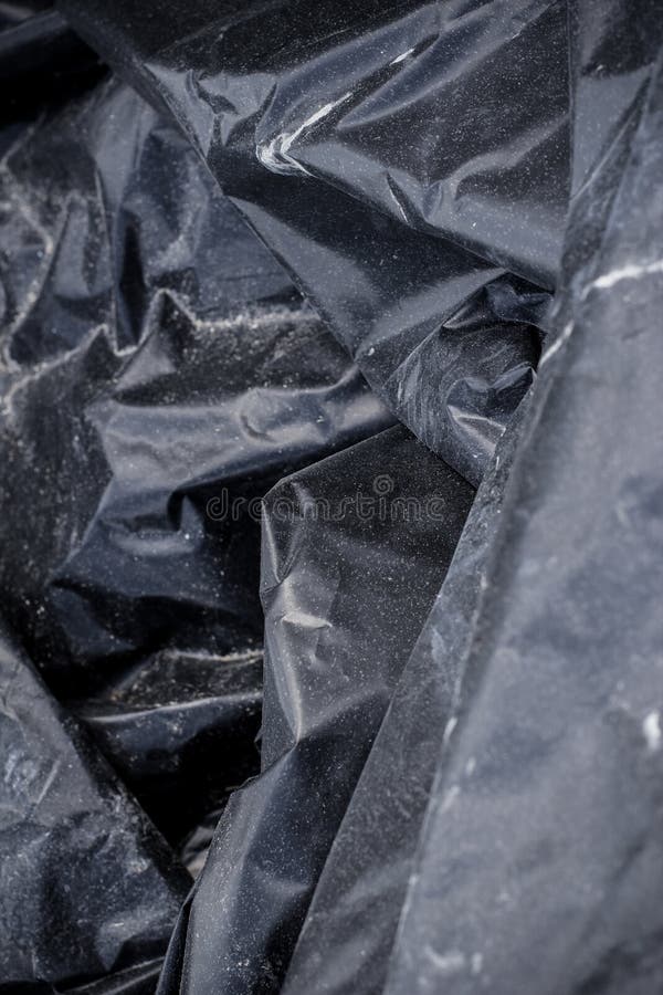 Large Black and Rumpled Plastic Garbage Bag Stock Image - Image of ...