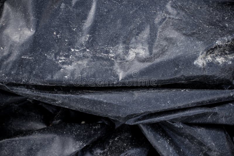 Large Black and Rumpled Plastic Garbage Bag Stock Photo - Image of ...