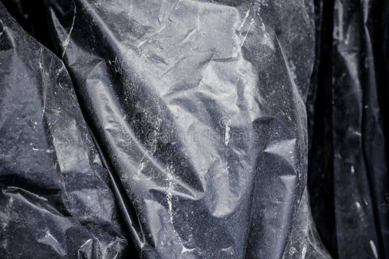 Large Black and Rumpled Plastic Garbage Bag Stock Image - Image of ...