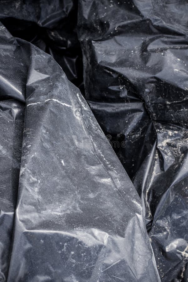 Large Black and Rumpled Plastic Garbage Bag Stock Image - Image of ...