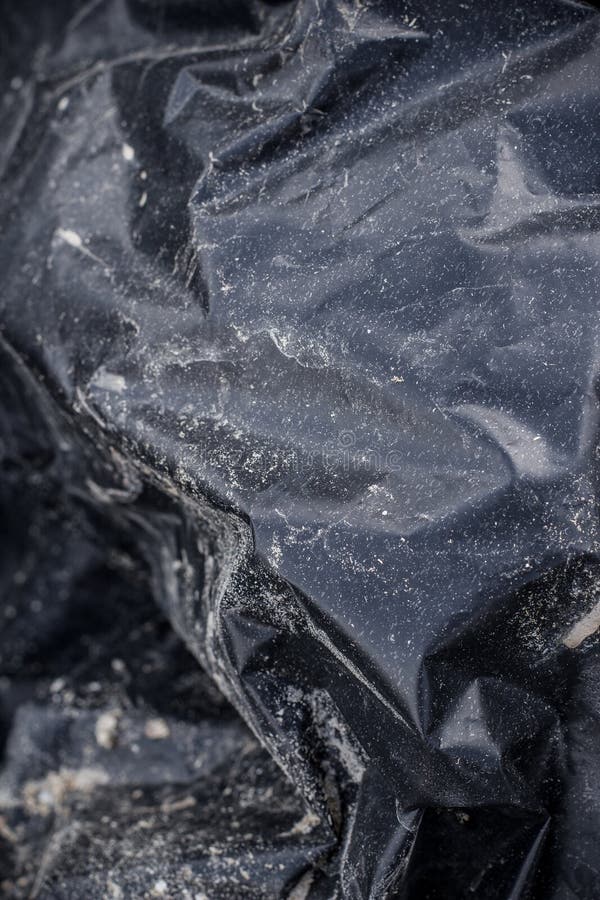 Large Black and Rumpled Plastic Garbage Bag Stock Image - Image of ...