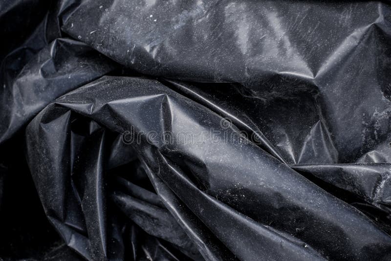 Large Black and Rumpled Plastic Garbage Bag Stock Photo - Image of dirt ...