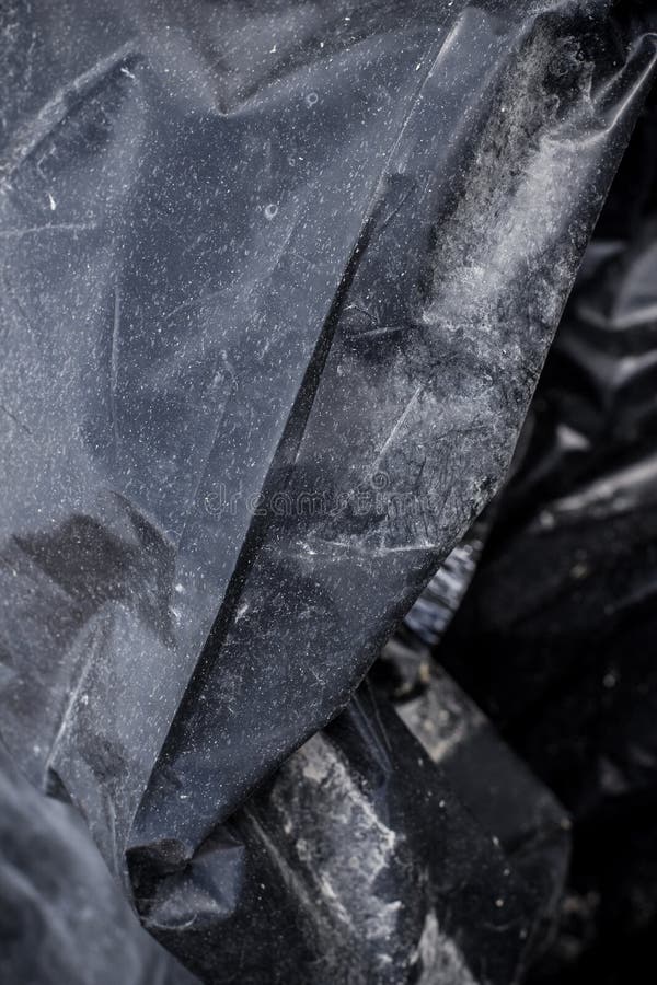 Large Black and Rumpled Plastic Garbage Bag Stock Image - Image of ...