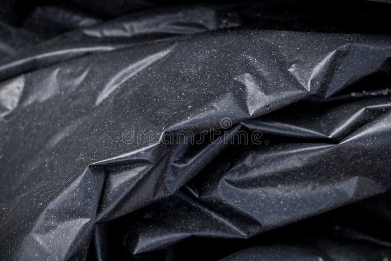 Large Black and Rumpled Plastic Garbage Bag Stock Image - Image of full ...