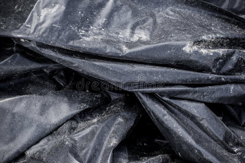 Large Black and Rumpled Plastic Garbage Bag Stock Image - Image of ...