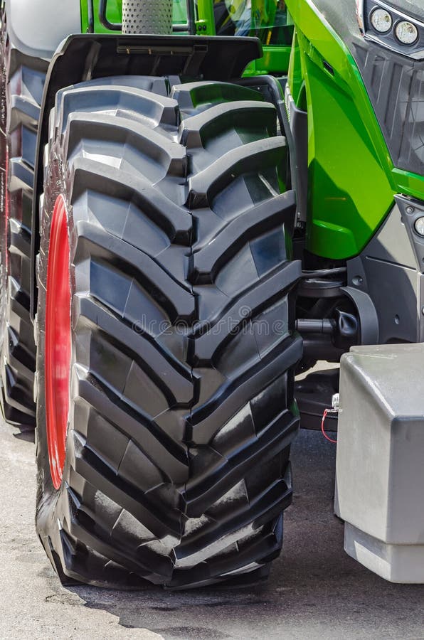 A Large Black Tractor Wheel with a Tread Stock Image - Image of farm ...