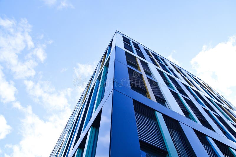 Large Blue Building with the Sky Above Stock Photo - Image of building ...