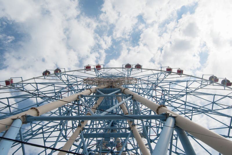 Large Blue Ferris Wheel on a Blue Sky Background Stock Image - Image of ...