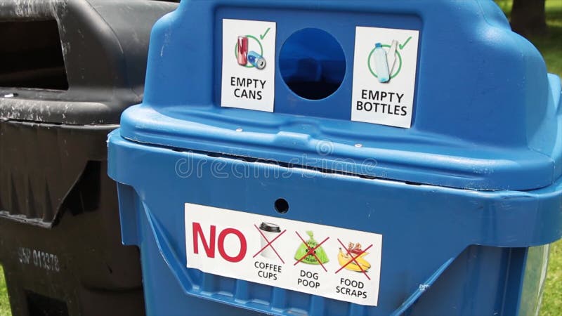 Large Blue Recycle Bin with Circle Opening and White Sticker Captions ...