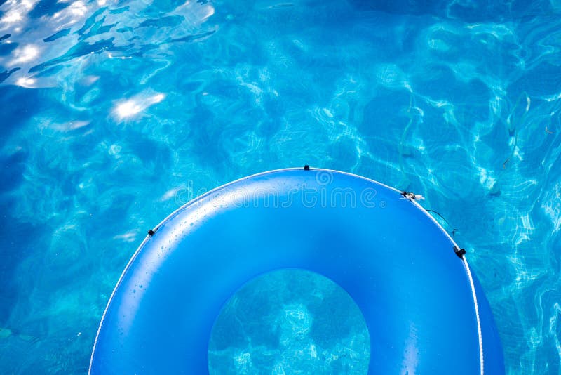 A Large Blue Round Float on a Pool of Transparent Water, Copy Space ...