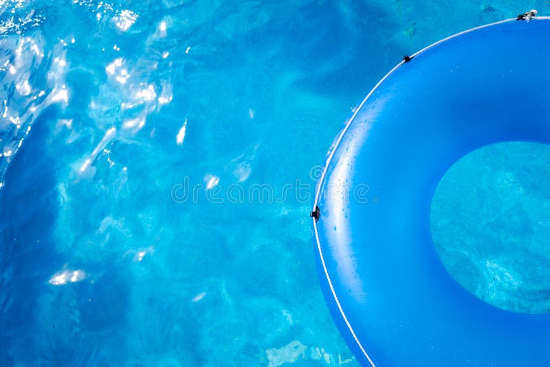 A Large Blue Round Float on a Pool of Transparent Water, Copy Space ...