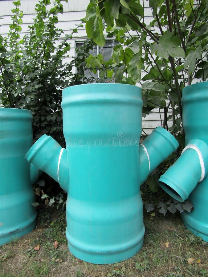 Blue fitting sewer pipes stock image. Image of window - 125774159
