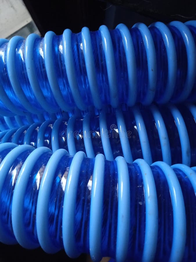 The Large Blue Water Hose is Being Stored Stock Photo - Image of stored ...