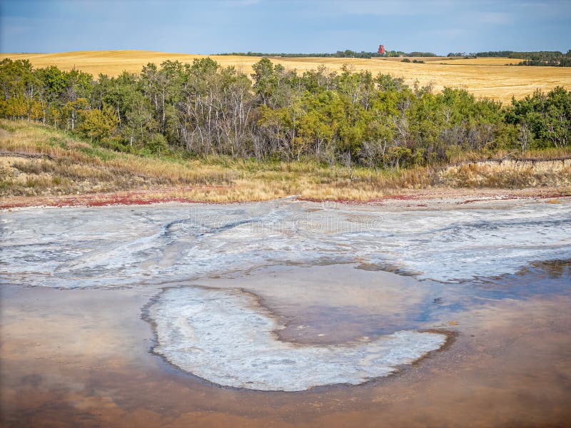 A Large Body of Water with a Red Object in the Distance Stock Image ...