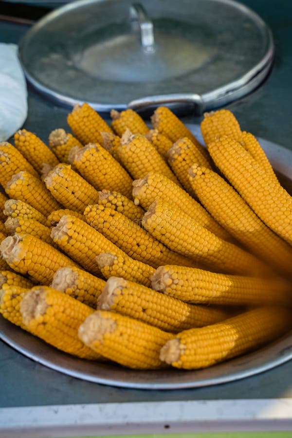 A Large Boiled Corn Lies in a Large Iron Pan Stock Image - Image of ...