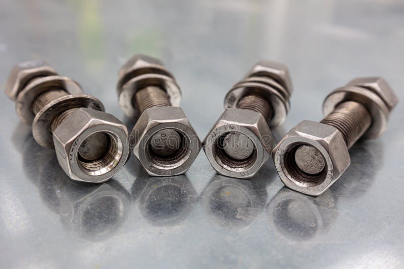 Large Bolts and Nuts on a Galvanized Sheet Stock Image - Image of ...