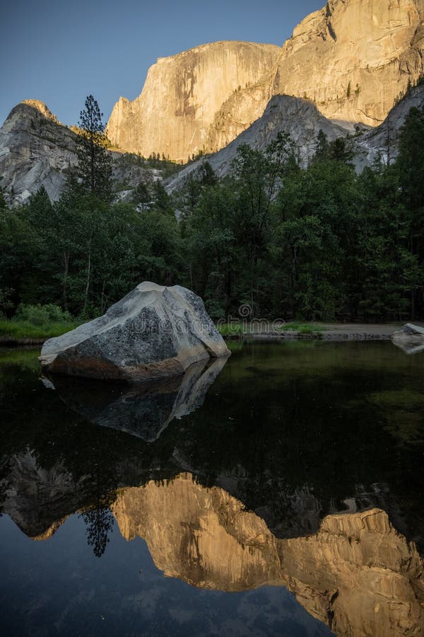 Large Boulder and Half Dome Reflect in Mirror Lake Stock Image - Image ...