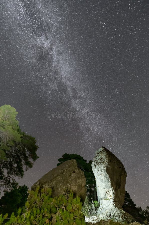 Large Boulder Illuminated Under the Milky Way Stock Photo - Image of ...