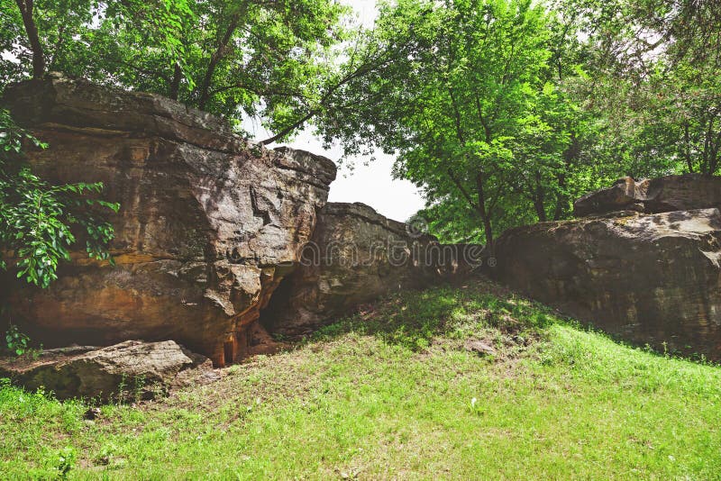 Large Boulder in Shade of Trees Stock Image - Image of green, slope ...