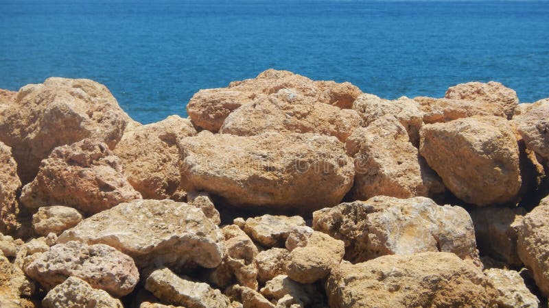 Large Boulders that Act As Wave Barriers and Breakers. Stock Image ...