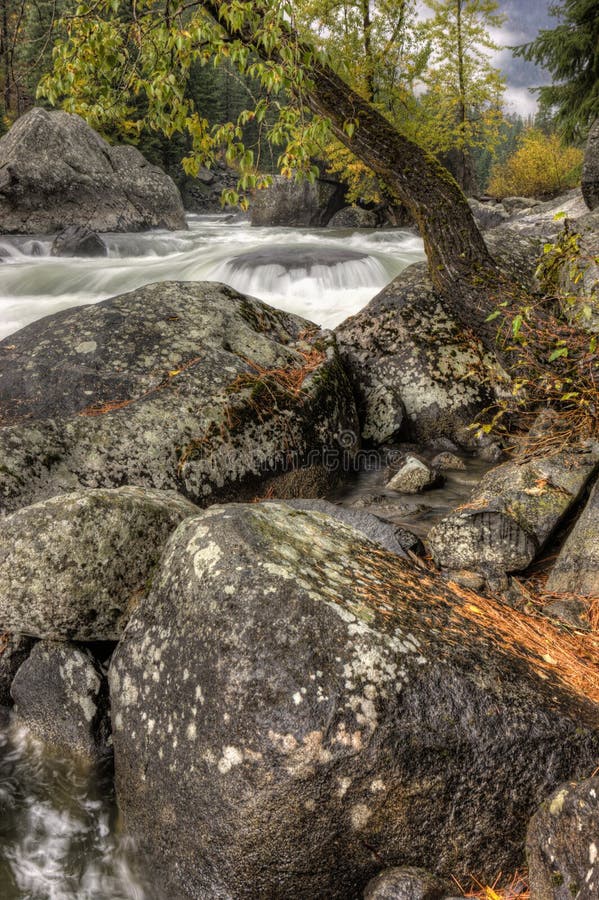 Large boulders by river. stock image. Image of autumn - 46414571