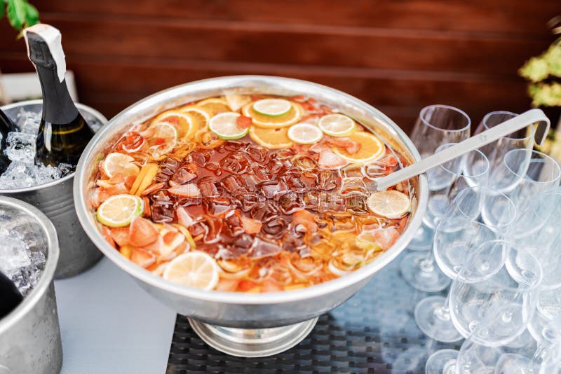 Large Bowl of Lemonade with Ice and Sliced Fruit Stock Photo - Image of ...