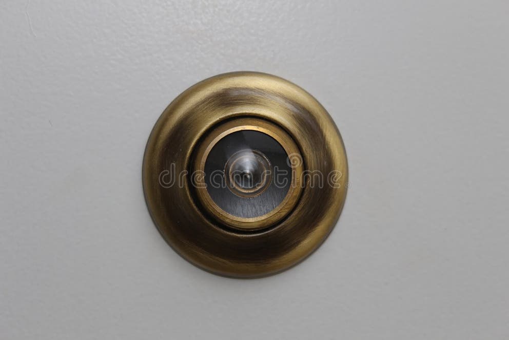 Large Brass Pinhole in a Door Stock Image - Image of outside, check ...
