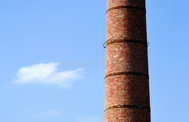 Large Brick Chimney Stack Closeup. Rusty Metal Reinforcing Straps ...