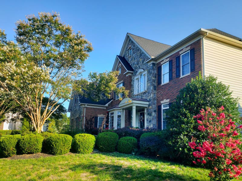 Large Brick Country House with Beautiful Landscaping Editorial Photo ...