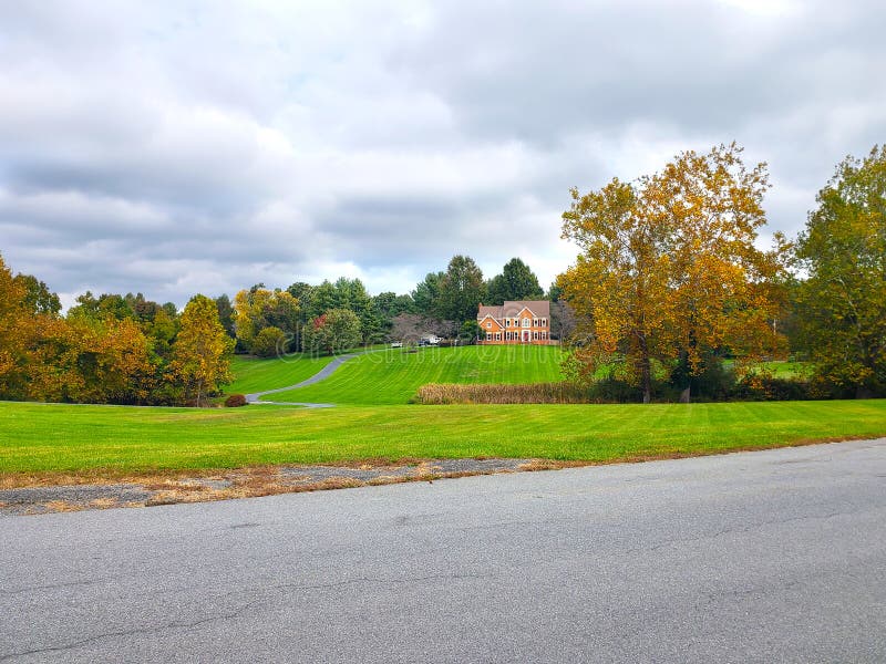 Large Brick Farmer S House. with Big Field Under a Blue Sky Stock Image ...